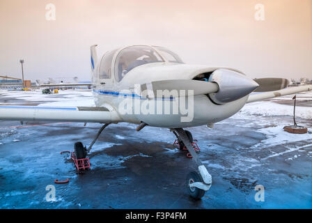 white plane in airport at non flying weather Stock Photo - Alamy
