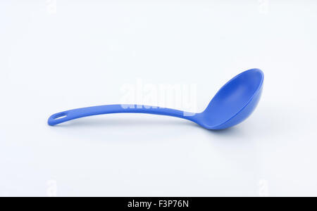 blue ladle on white background Stock Photo - Alamy