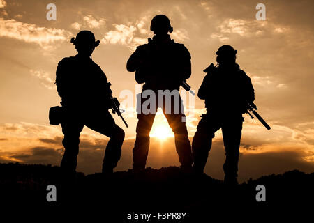 United States Army rangers with assault rifle on dark background Stock ...