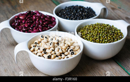 Four types of dry beans in the bowl Stock Photo - Alamy