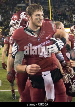 Washington State quarterback Luke Falk (4) reacts after defeating ...