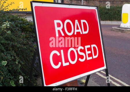 Temporary red road closed sign Stock Photo - Alamy