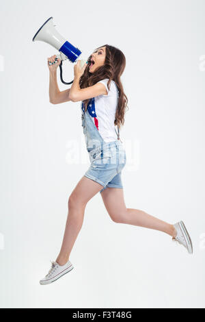 Young woman shouting in megaphone with MACHINE LEARNING inscription ...