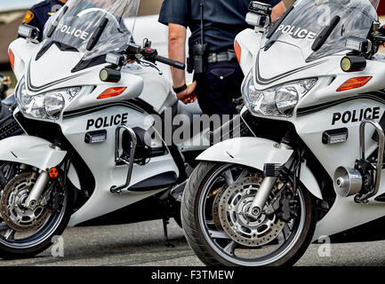 Police motorcycles parked on road Stock Photo - Alamy