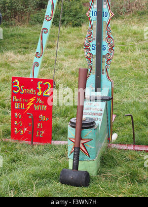 Fairground ring the bell strength test Stock Photo - Alamy