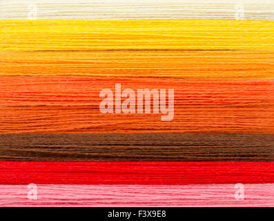 Many colorful threads, closeup Stock Photo - Alamy