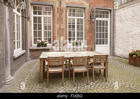 The empty chairs in the yard of the house in winter Stock Photo - Alamy