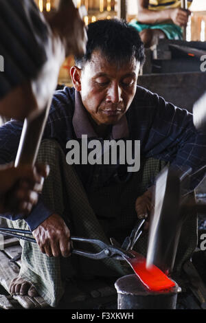 Blacksmith in village at Inle Lake, Shan-State, Myanmar, Asia Stock ...