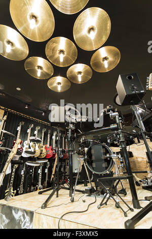 Drum set for sale at music store Stock Photo - Alamy