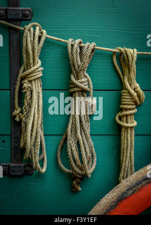 Western Rope And Wooden Wheel Stock Photo - Alamy