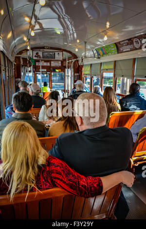 Interior of New Orleans streetcar with passengers Stock Photo - Alamy