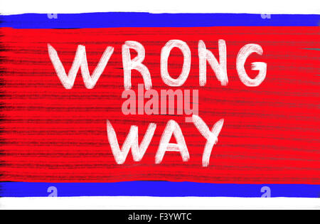 Wrong Way Go Back traffic warning sign at the exit to a tunnel in ...