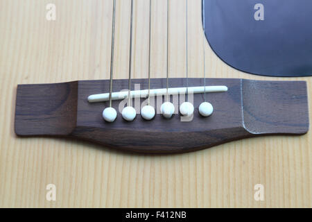 metal strings on an acoustic guitar close up close up Stock Photo - Alamy