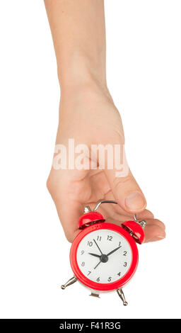 Humans hand holding alarm clock Stock Photo - Alamy
