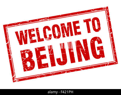 Beijing red square grunge welcome to stamp Stock Photo - Alamy
