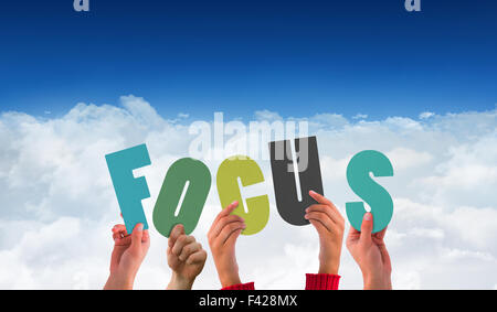 Composite image of hands showing focus Stock Photo - Alamy