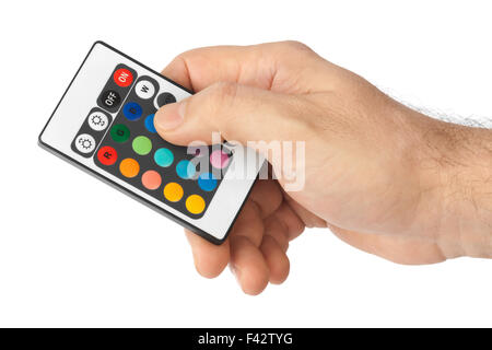 Remote control for change colors in hand Stock Photo - Alamy