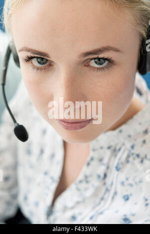 Portrait of young telemarketer Stock Photo - Alamy