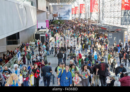 A crowd of visitors and fans to the ComicCon comic book and movie ...