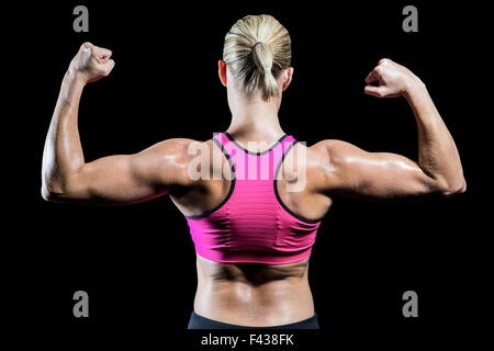 Strong muscular woman flexing his arms. Fit and healthy woman on Stock ...