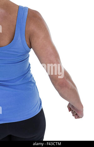 fit muscular woman back view standing on old metal crane Stock Photo ...