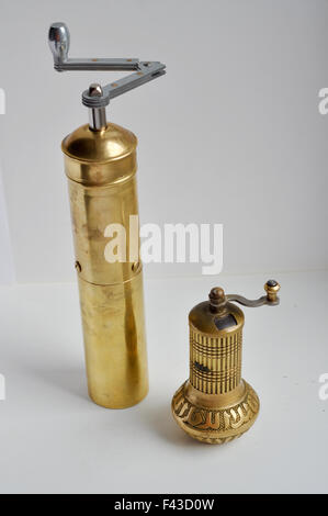 Old fashioned hand mill with coffee beans Stock Photo - Alamy
