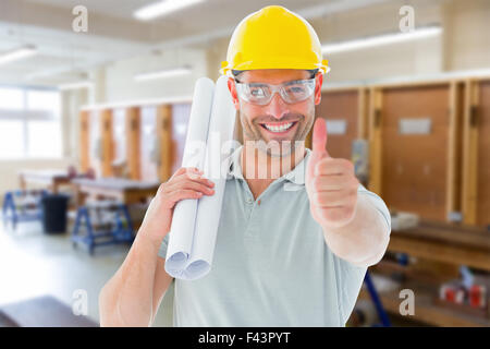 Composite image of architect with plan Stock Photo - Alamy