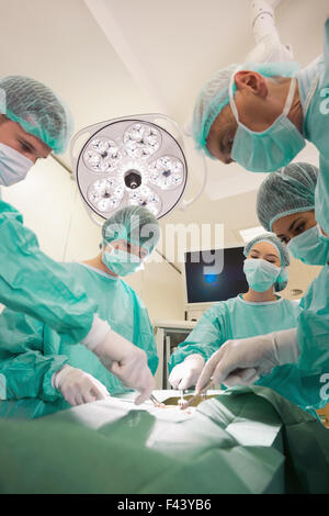 Medical students practicing surgery on model Stock Photo - Alamy