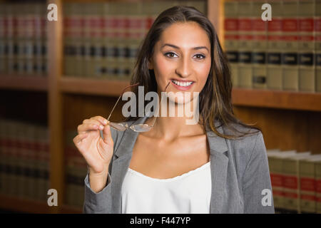 Pretty lawyer in the law library Stock Photo - Alamy