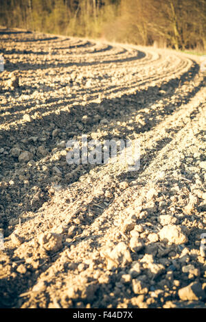 Farm field plowed grooved earth soil furrows for crop planting Stock ...