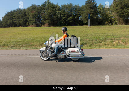 A woman riding Harley Davidson motorcycle Stock Photo - Alamy