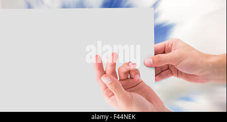 Composite image of hand showing card Stock Photo - Alamy