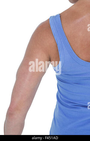 Back view of adult young woman with black straight hair contemplating ...
