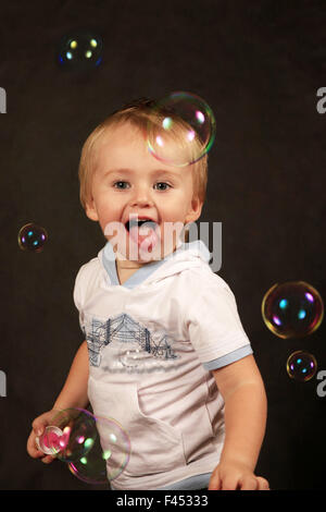 small soap bubbles on water surface, marco background Stock Photo - Alamy