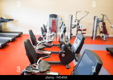 Selection of different exercise machines at the gym Stock Photo - Alamy