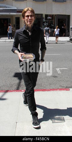 Buckcherry frontman, Josh Todd out and about in Beverly Hills carrying ...