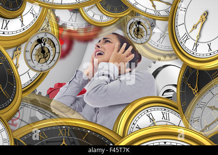 Composite image of desperate businesswoman Stock Photo - Alamy