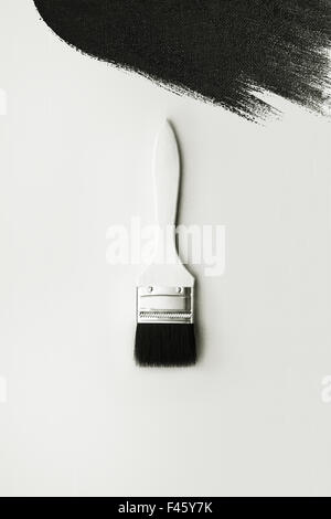 Paint and brush as the face of German dictator Adolf Hitler. Fuehrer ...