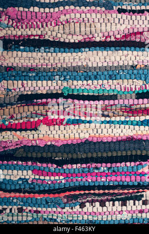 Multi-coloured structure of a carpet connected in manual Stock Photo ...