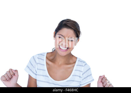 A pretty brunette woman cheering Stock Photo - Alamy
