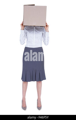 Businesswoman with cardboard box over head Stock Photo - Alamy