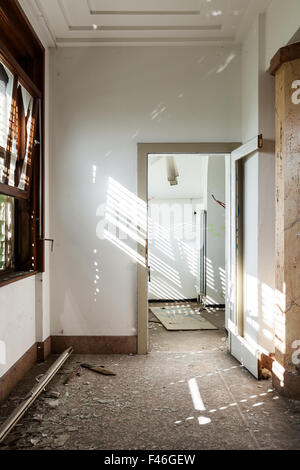 abandoned room inside destroyed house with old wallpaper and wooden ...
