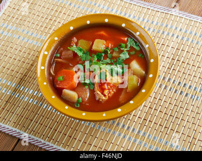shurpa - Uzbek cuisine ю turkey soup with tomatoes Stock Photo - Alamy