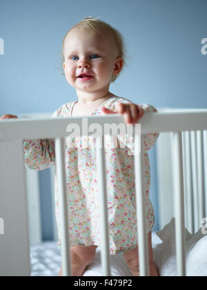 baby awake in cot Stock Photo - Alamy