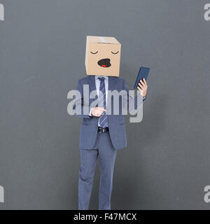 Composite image of anonymous businessman with his smartphone Stock ...