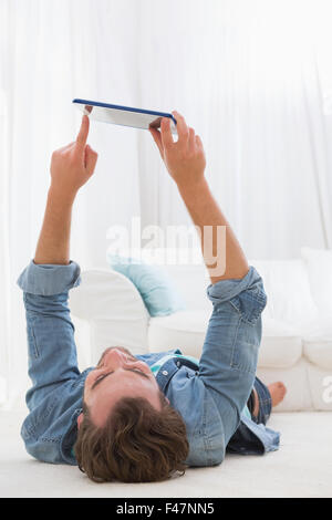 Tablet computer lying on the table at workplace Stock Photo - Alamy