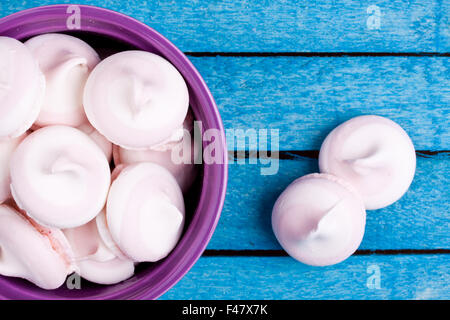 French vanilla meringue cookies on white background with copy space ...