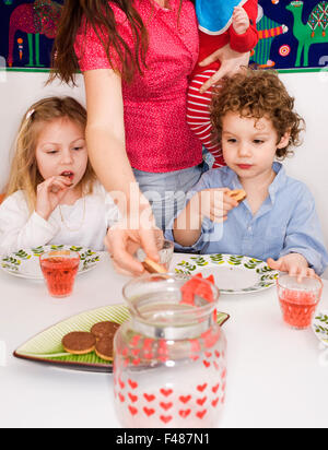 Baby cookies on table Stock Photo - Alamy