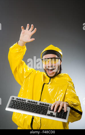 Man wearing yellow suit with keyboard Stock Photo - Alamy