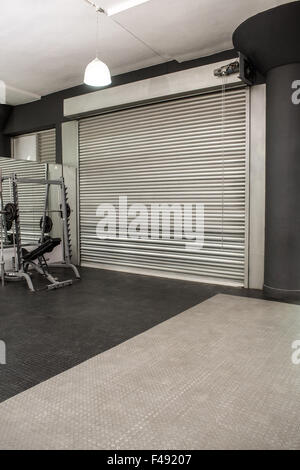 Exercise room with shutters Stock Photo - Alamy